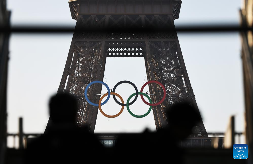 Olympic Rings on Eiffel Tower unveiled 50 days ahead of Paris 2024-Xinhua