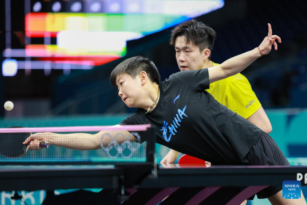 Chinese national table tennis team attends training session ahead of Paris 2024-Xinhua