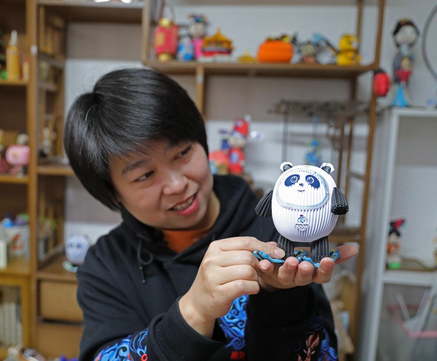 In Pics: Paper pleating artwork helps to promote spirit of Beijing ...