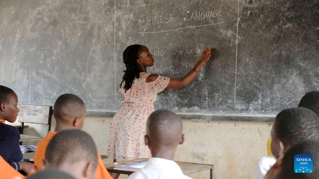 Feature: Ugandan teacher on mission to spread Chinese language teaching ...