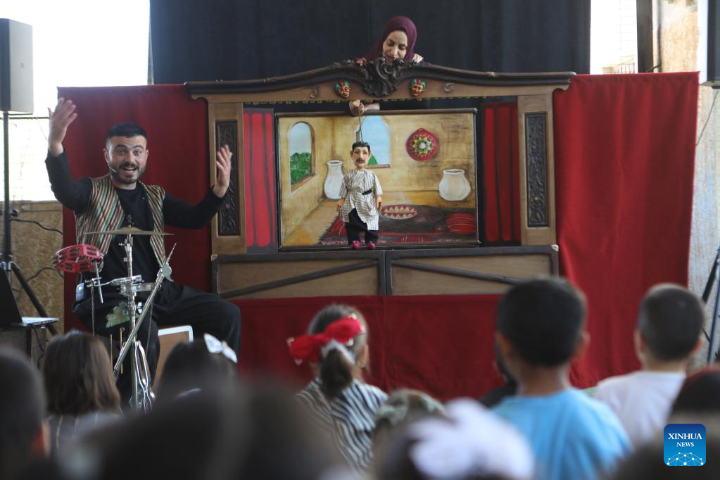 Feature: Mobile puppet theater brings joy, change to West Bank children ...