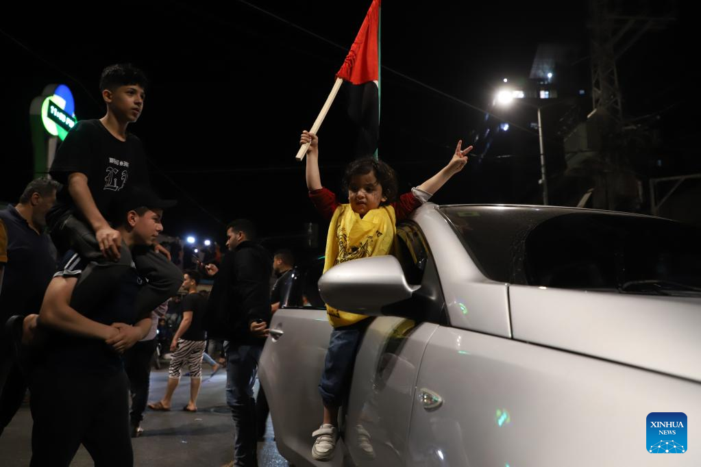 Palestinians celebrate ceasefire between Israel and Palestinian Islamic ...