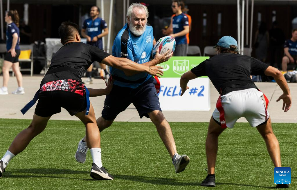 Participants compete during Rugby in Square Tournament in Toronto-Xinhua