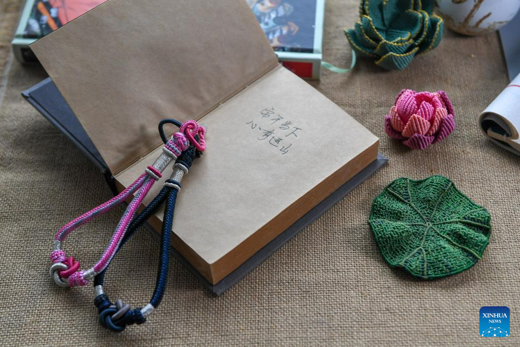 Pic story: inheritor of traditional string-weaving technique in NE ...