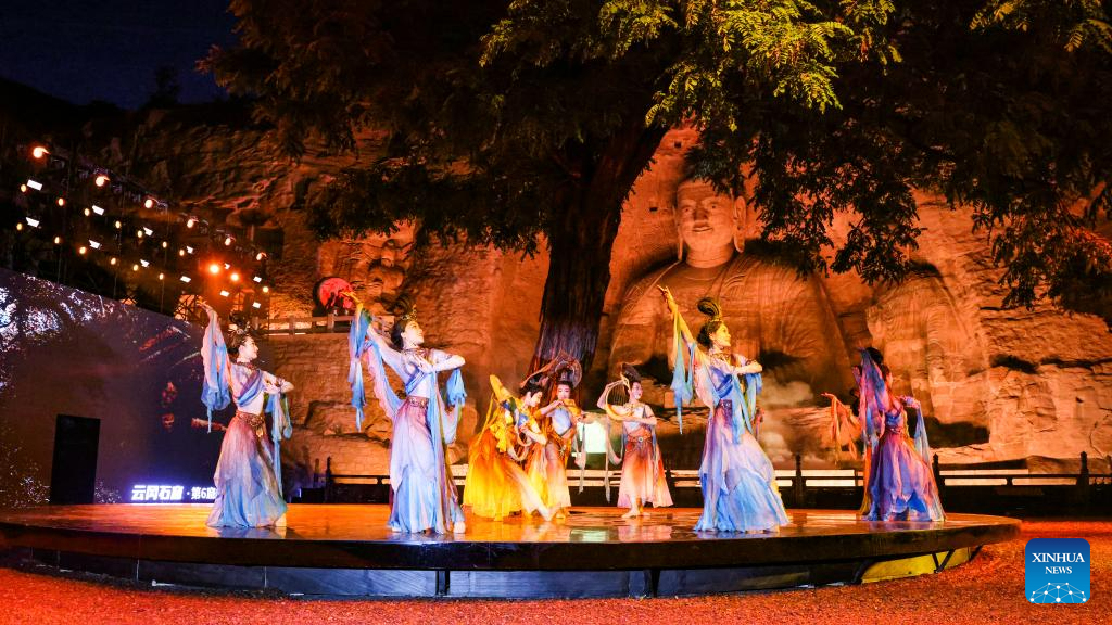 "See Yungang Again" art show performed at China's Yungang Grottoes-Xinhua