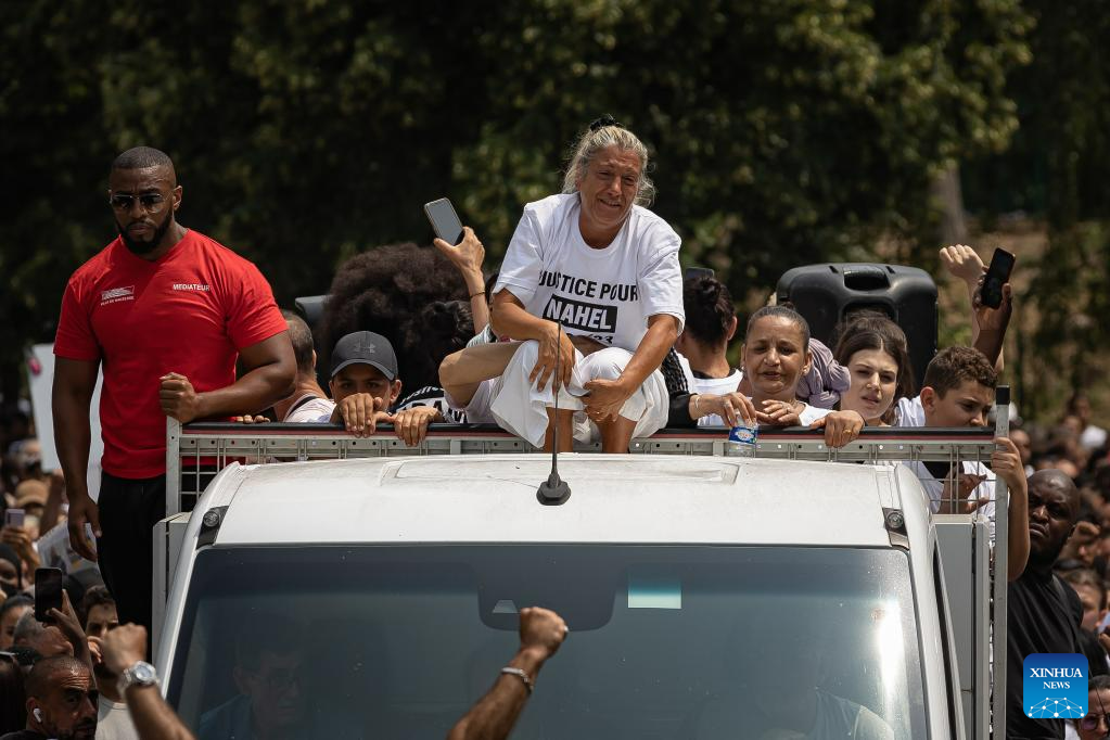 Protesters clash with riot officers at march for killed teenager in ...