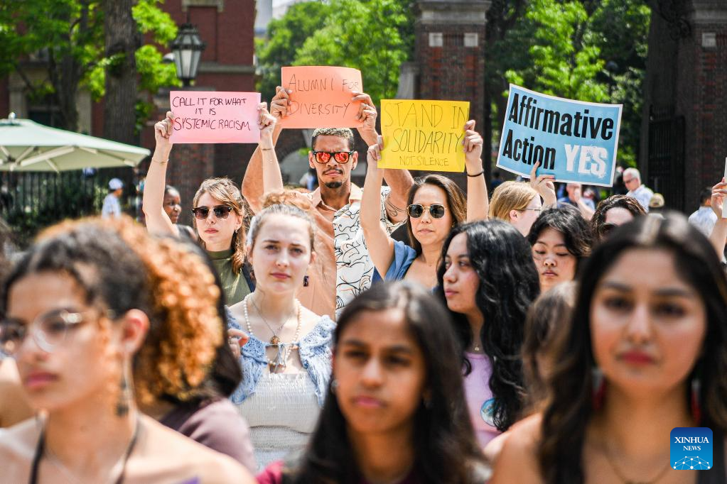 People participate in rally protesting Supreme Court's ruling against ...