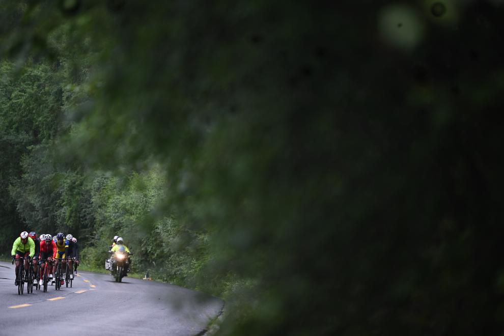 Riders compete during 22nd Tour of Qinghai Lake cycling race-Xinhua