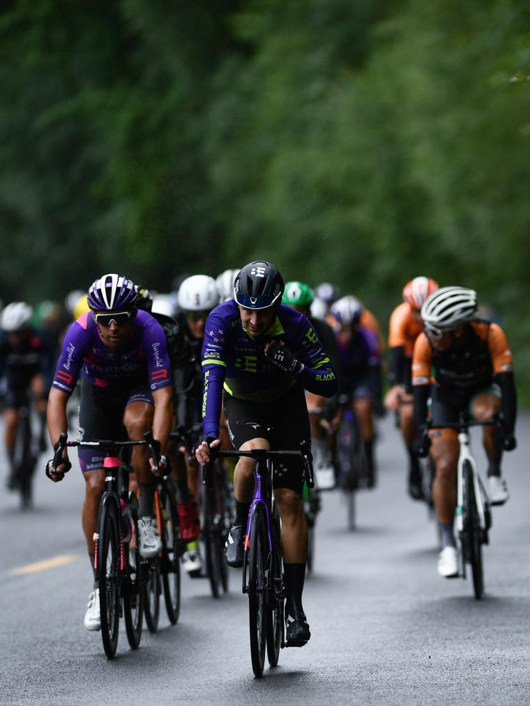 Riders compete during 22nd Tour of Qinghai Lake cycling race-Xinhua