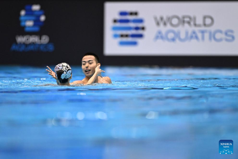 China's Cheng, Shi win mixed duet free gold at swimming worlds-Xinhua