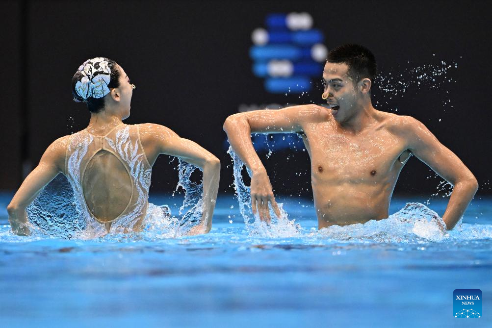 China's Cheng, Shi win mixed duet free gold at swimming worlds-Xinhua