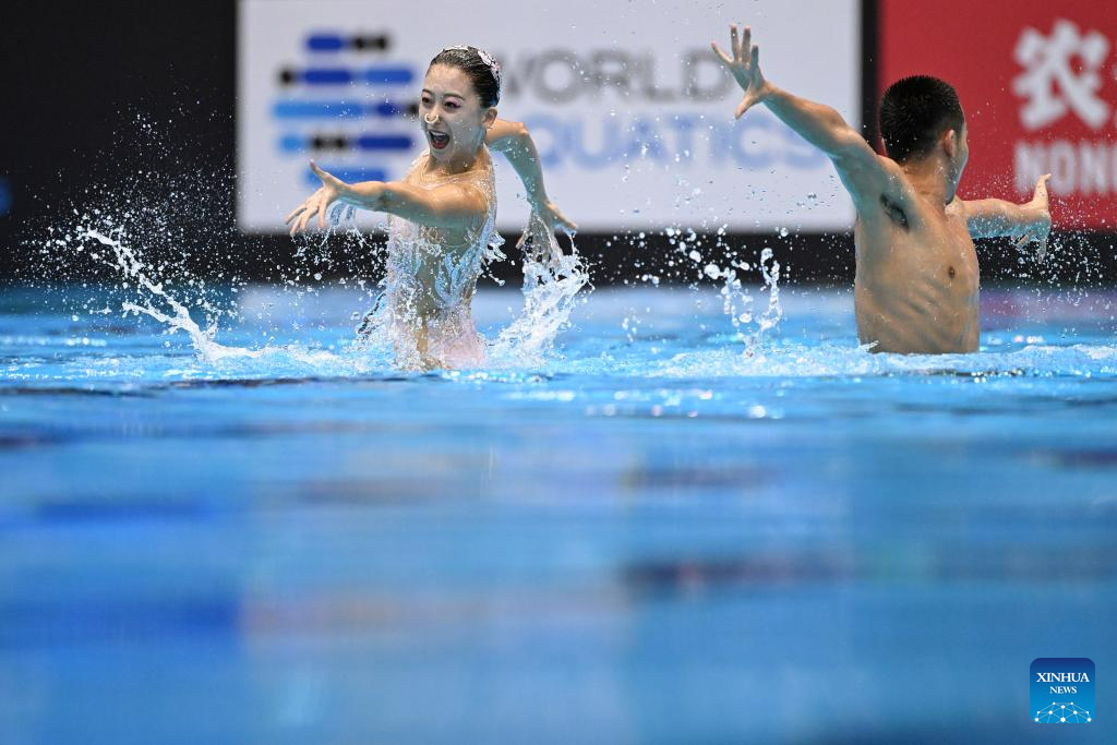 China's Cheng, Shi win mixed duet free gold at swimming worlds-Xinhua