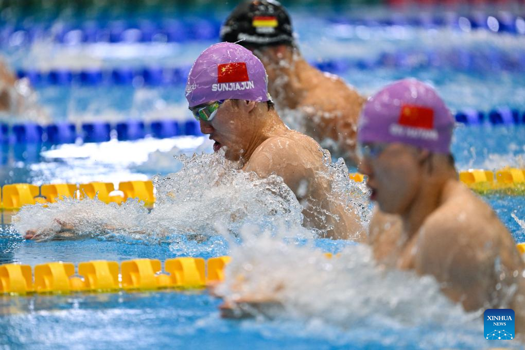 China's Qin leads field into men's 50m breaststroke final at Aquatics ...