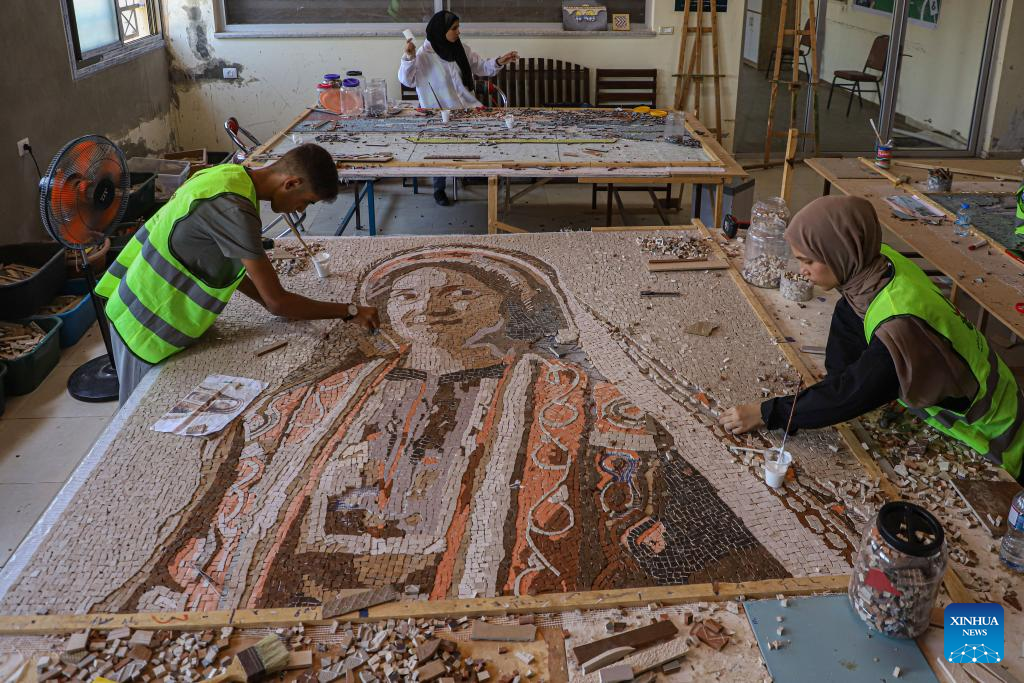 Feature: Gazan teenagers create mosaic murals to revive Palestinian ...