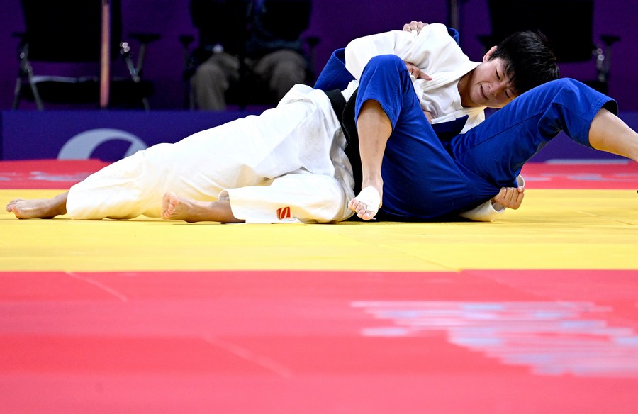 Chinese judoka Tang collects silver at Hangzhou Asiad-Xinhua