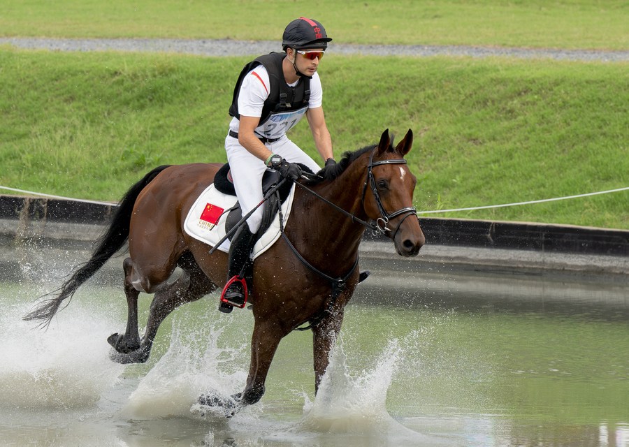 Hua shines as China grabs double eventing golds at Hangzhou Asiad-Xinhua