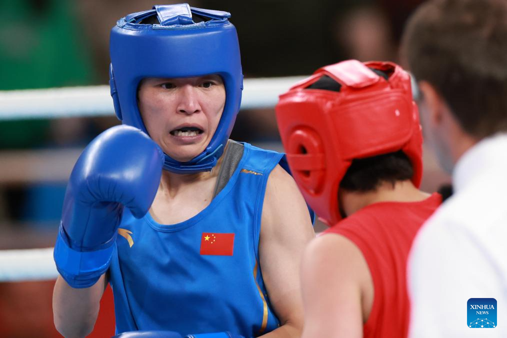 Chinese veteran boxers clinch maiden Asiad golds-Xinhua