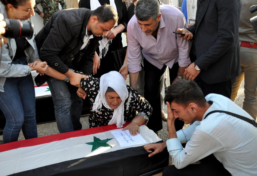 Funeral procession honoring fallen Syrian military personnel takes ...
