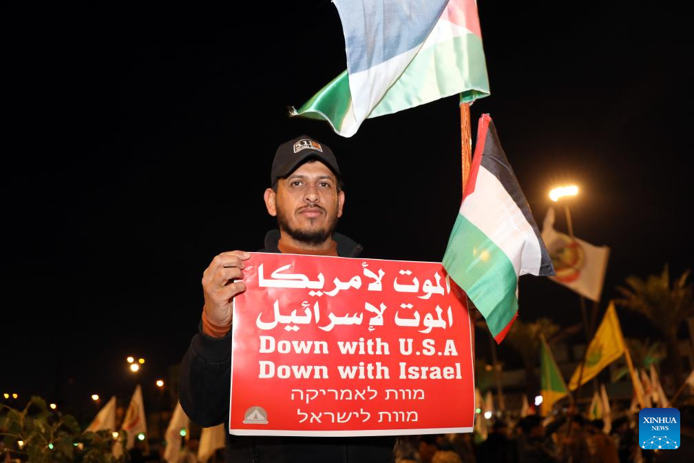 Iraqis rally in Baghdad to protest against U.S.-Britain strikes in ...