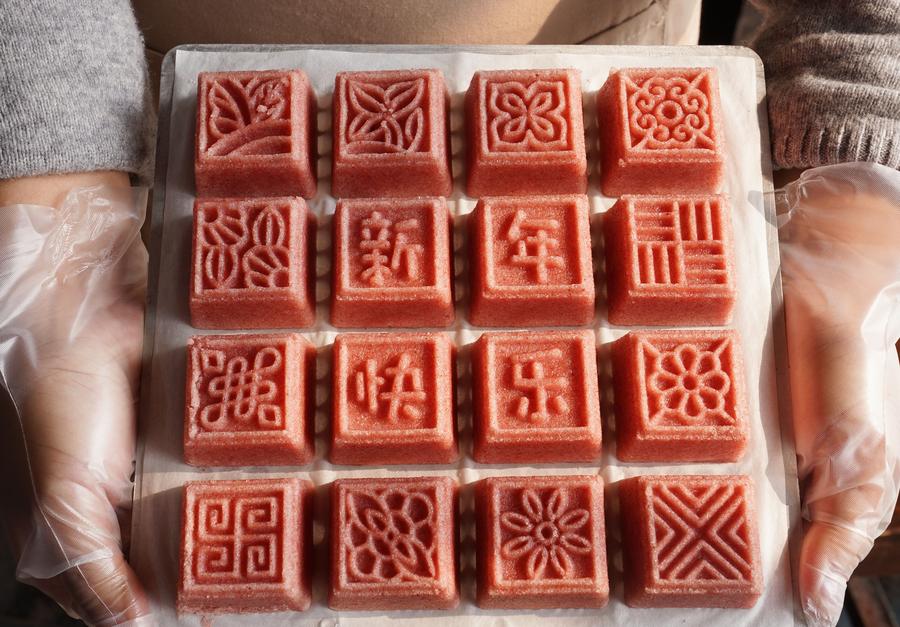 MasterOfCrafts | Zhuang Rice Cake craft inheritor in east China's ...