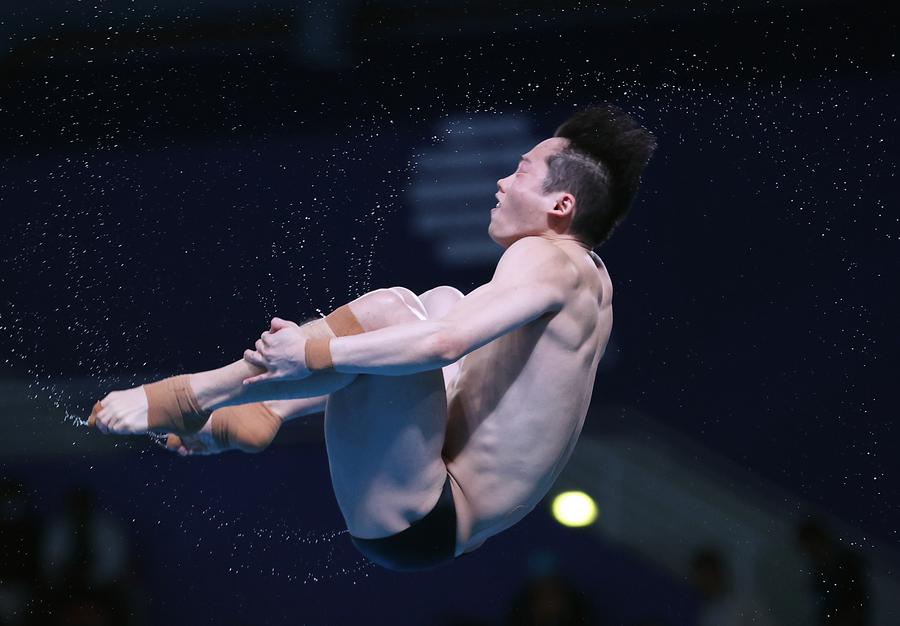 China's Wang clinches 3rd straight 3m springboard worlds title-Xinhua