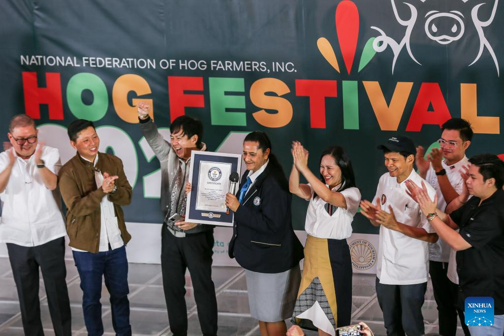 Hog farmers set Guinness World Record for most varieties of pork dishes ...