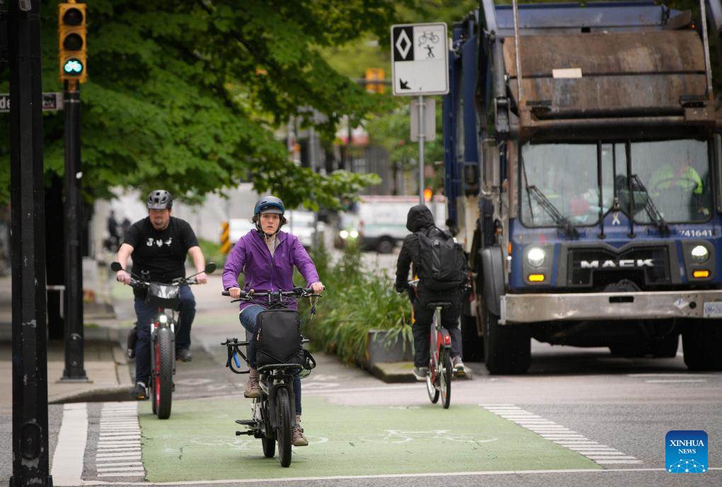 Cyclists ride on occasion of World Bicycle Day in Vancouver-Xinhua