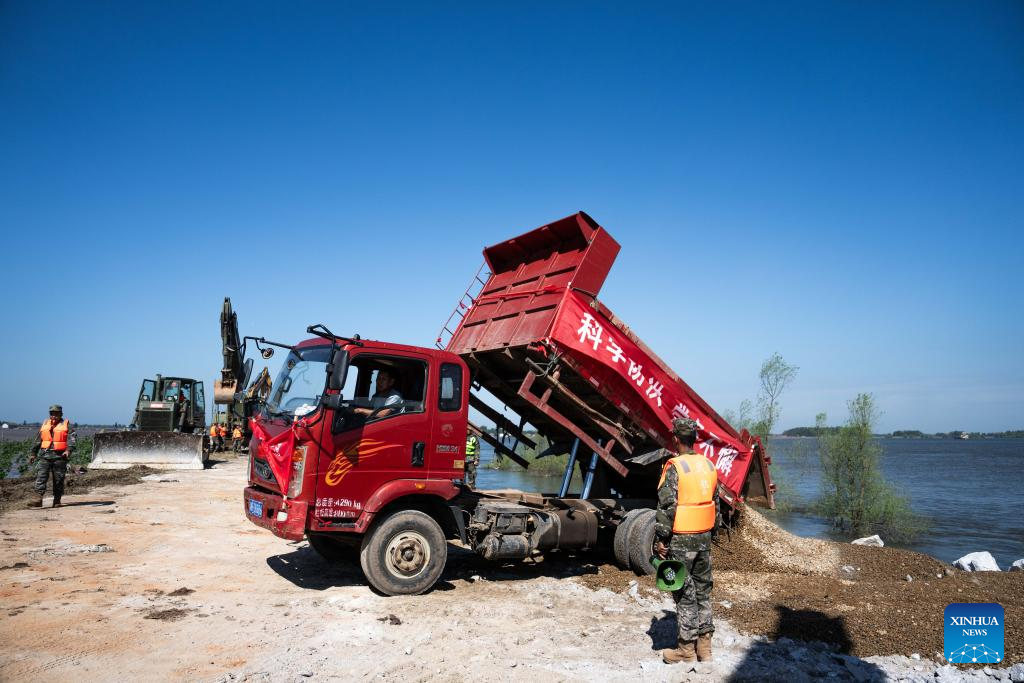 Team deployed to aid rescue after dike breach in China's second-largest ...