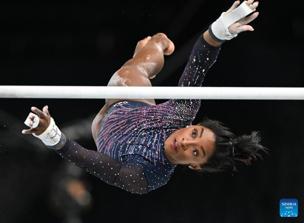 Members of team United States participate in artistic gymnastics ...