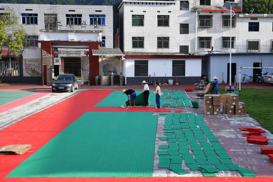 Campus reconstructed for new semester in rain-soaked Chinese city-Xinhua