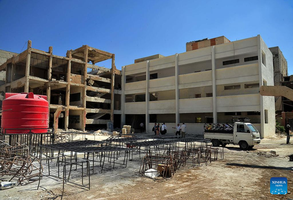 People work to rebuild school in Eastern Ghouta, Syria-Xinhua