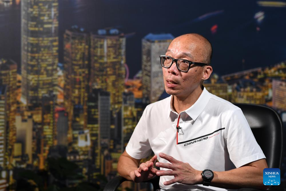 Feature: The "running man" of Hong Kong: celebrating patriotism with ...