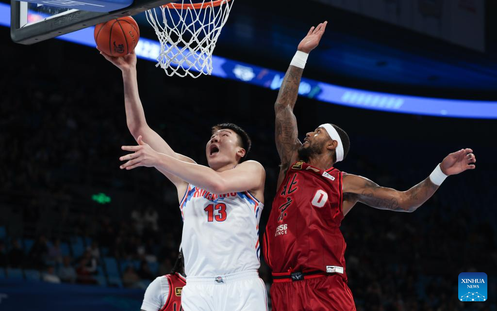 CBA league: Beijing Ducks vs. Xinjiang Flying Tigers-Xinhua