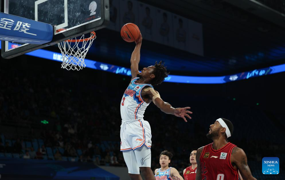 CBA league: Beijing Ducks vs. Xinjiang Flying Tigers-Xinhua