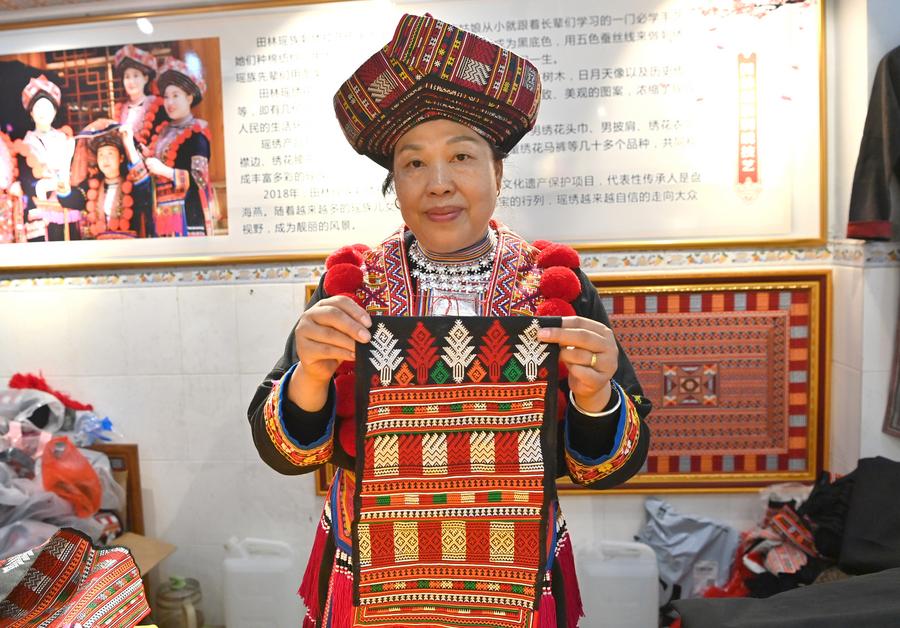 EnchantingGuangxi | Representative inheritor breathes new life into Yao ...