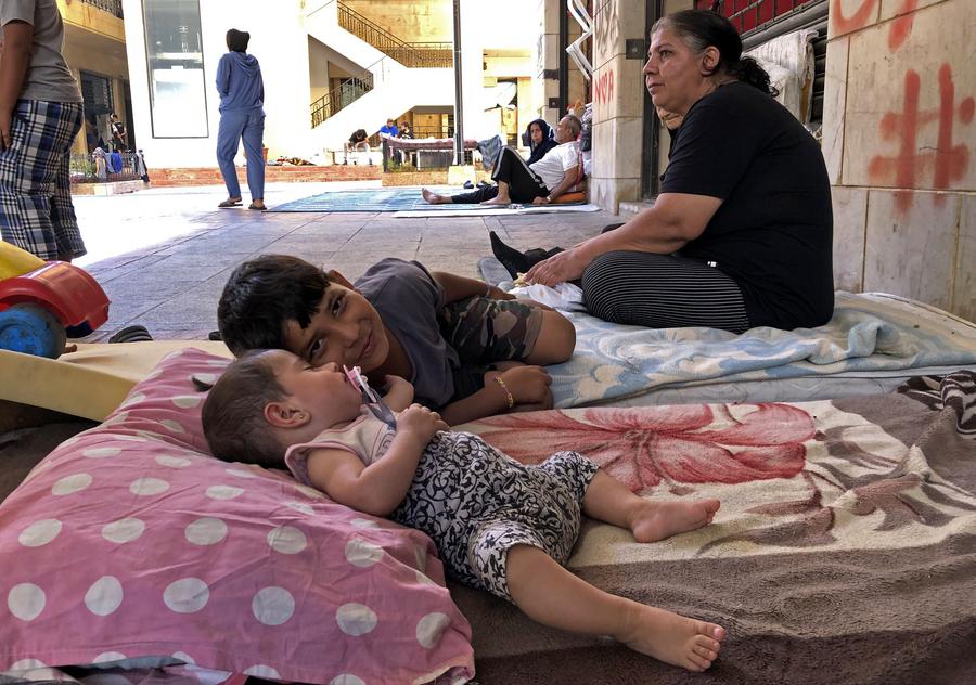 Displaced Lebanese struggle to cope with winter cold amid ongoing conflict with Israel-Xinhua