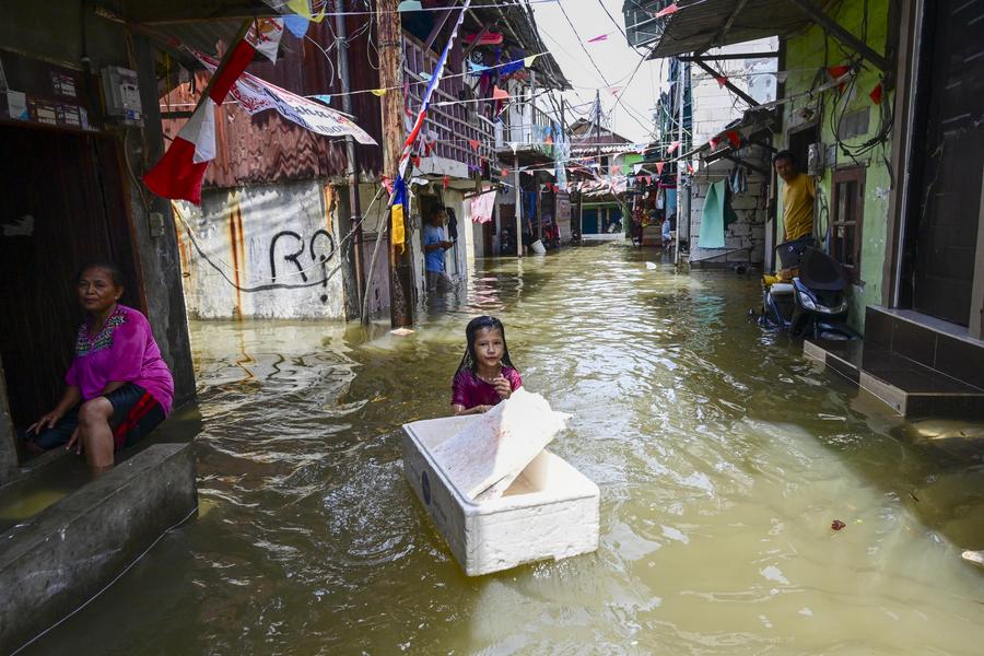 Asia Album: Streets in Indonesia's Jakarta flooded due to rising sea ...