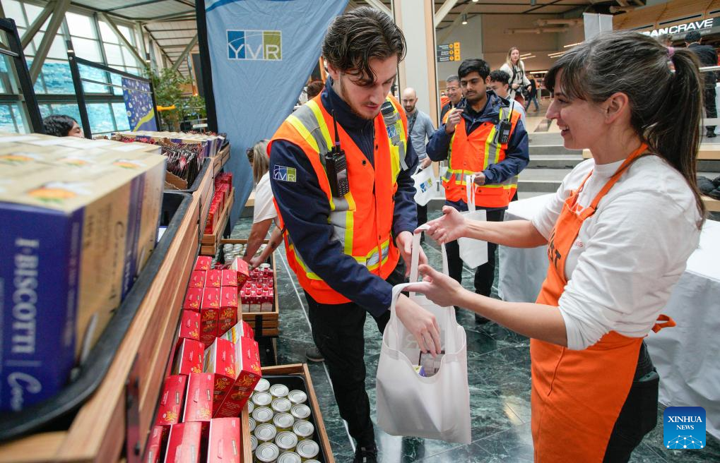 In pics: annual Holiday Hamper Drive event at Vancouver International ...