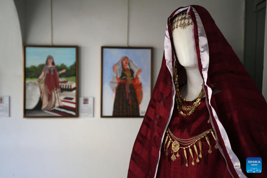 Traditional women's attire displayed during exhibition in Medea ...