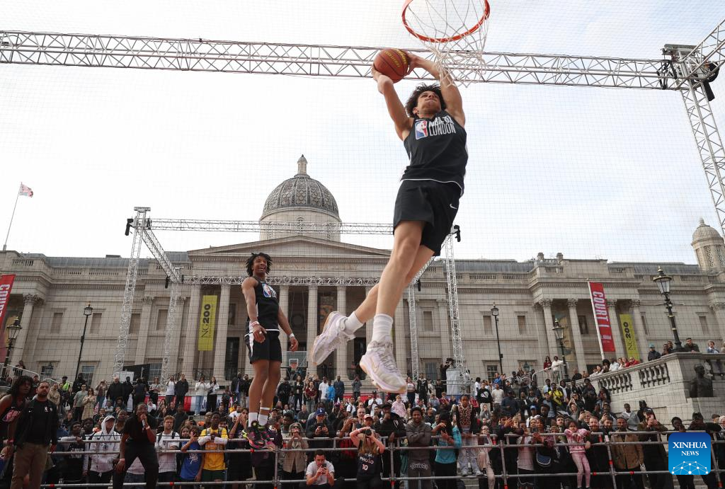 In pics: dunk show during Jr. NBA 3v3 tournament in London-Xinhua