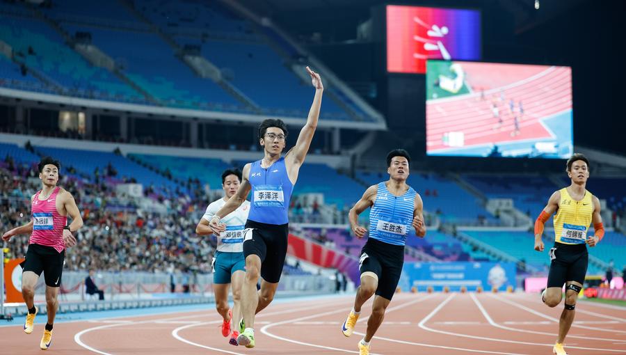 Feature: Chinese sprinter Li Zeyang's long journey to 100m gold-Xinhua