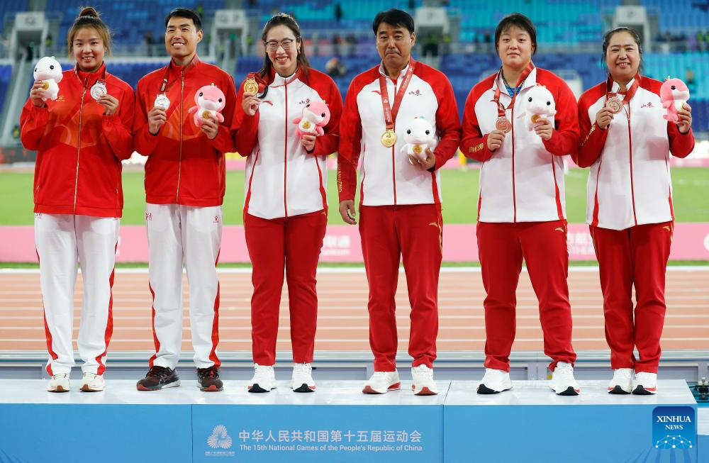 Discus world champion Feng Bin retains title at China's National Games ...