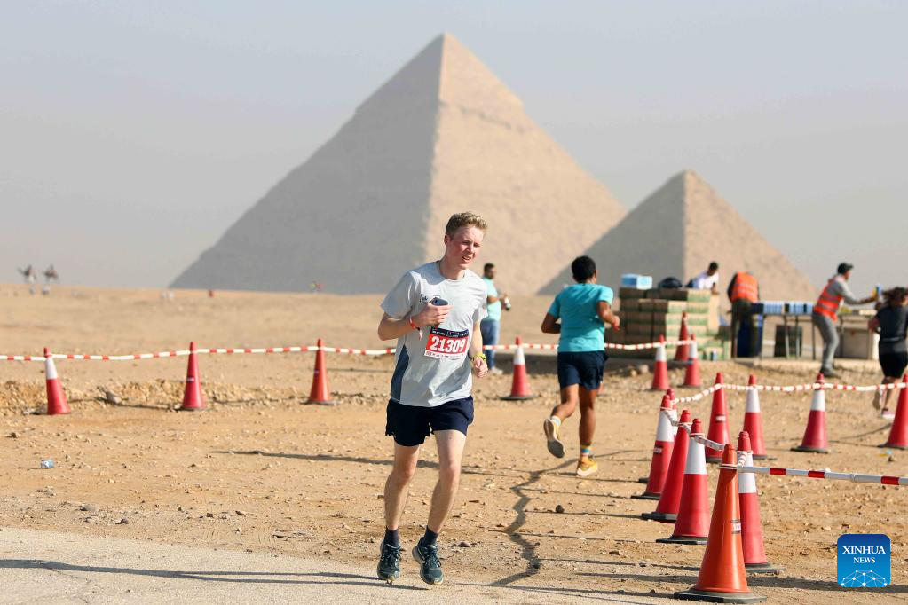 Feature: Runners "race through history" at Egypt's Pyramids Half ...