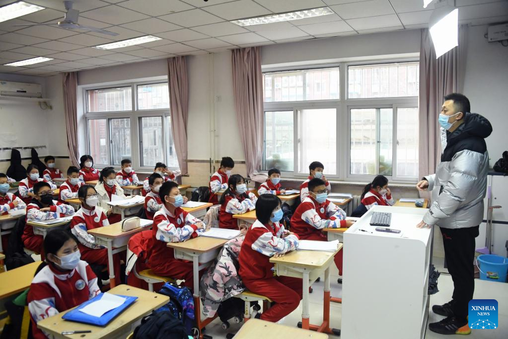 Primary and middle school students in Beijing return to school for ...