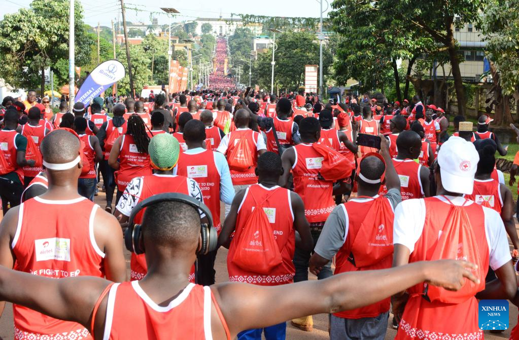 Thousands take part in marathon in Uganda to promote HIV/AIDS awareness ...