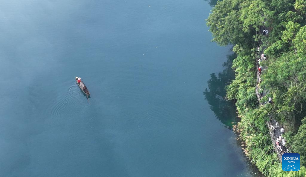 Tourists visit Dongjiang Lake scenic spot in Hunan-Xinhua