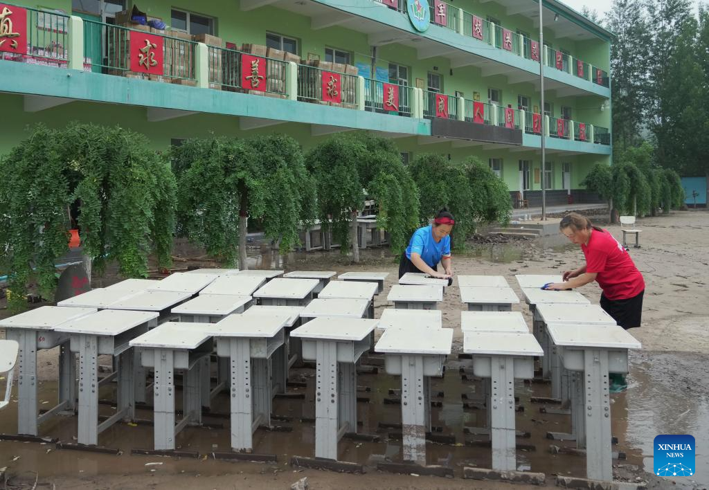 Schools carry out post-flood recovery work in Laishui County, N China's ...