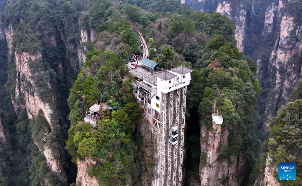 Tourists visit Zhangjiajie National Forest Park in China's Hunan-Xinhua