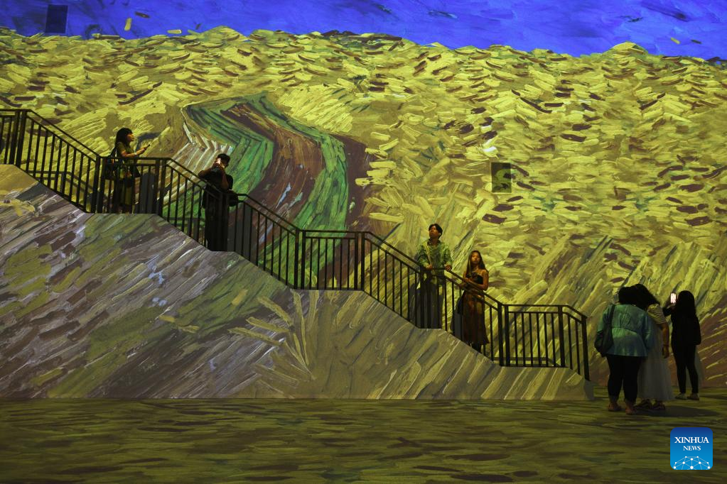 People attend preview event of "Van Gogh: The Immersive Experience" in ...
