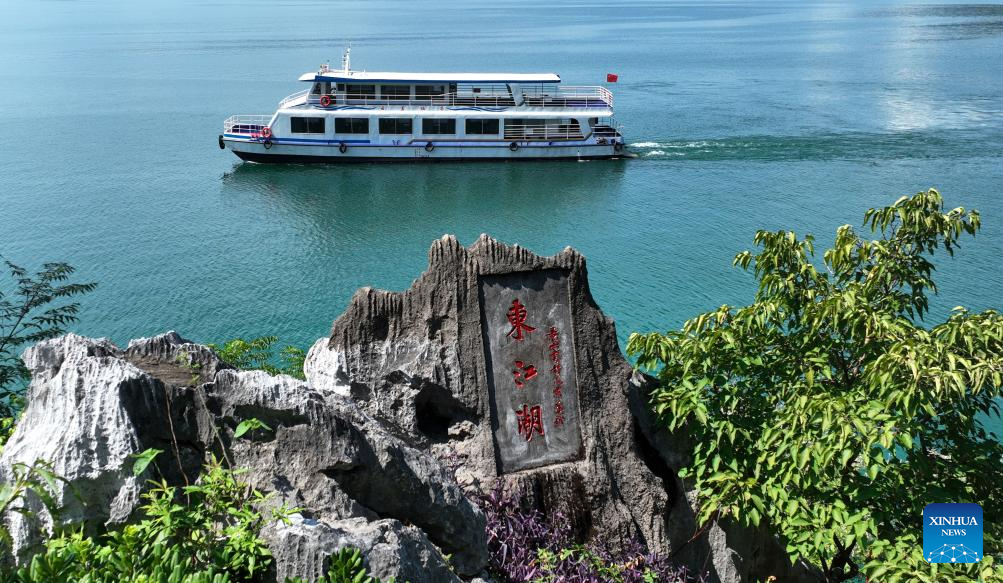 Tourists visit Dongjiang Lake scenic spot in Hunan-Xinhua
